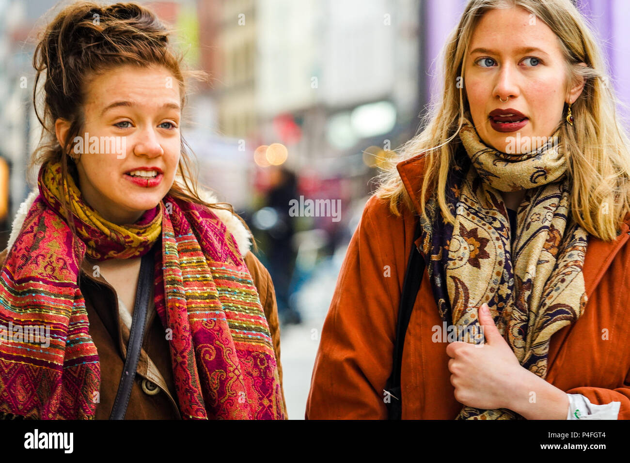 Two well-dressed young women on the street in Copenhagen, Denmark Stock ...