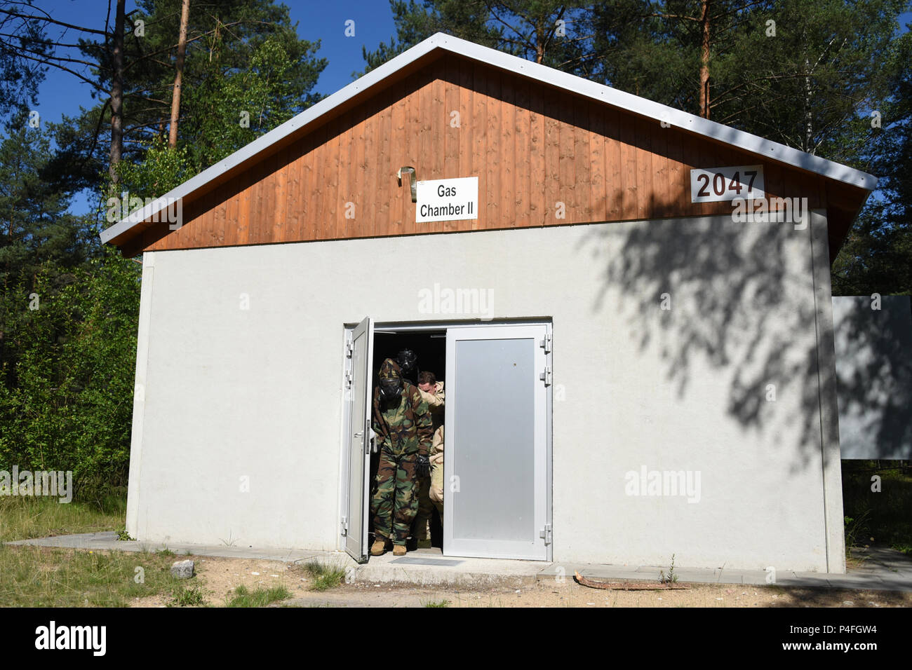 U.S. Soldiers assigned to 7th Army Training Command (7ATC) exit the gas ...