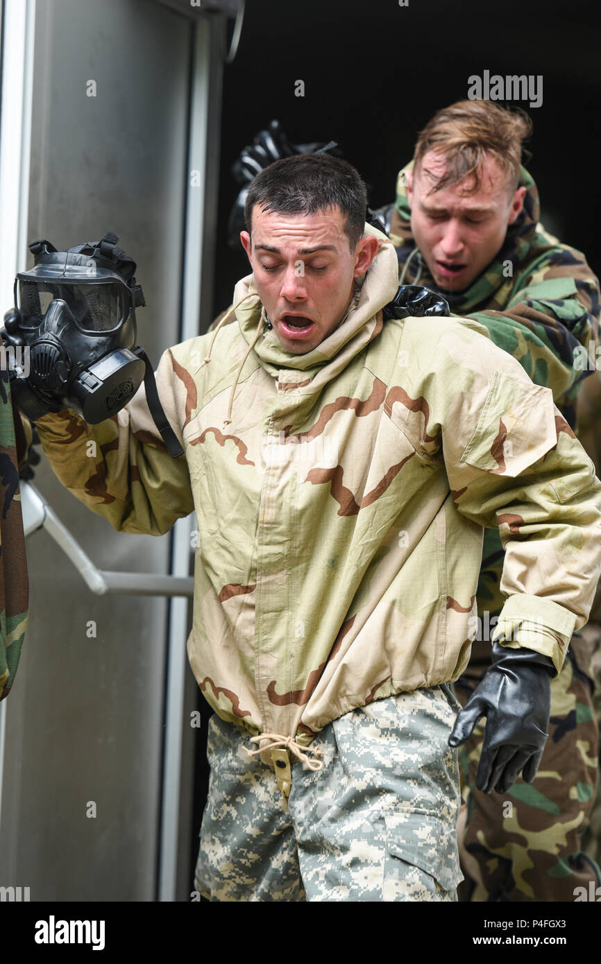 U.S. Soldiers assigned to 7th Army Training Command (7ATC) exit the gas ...