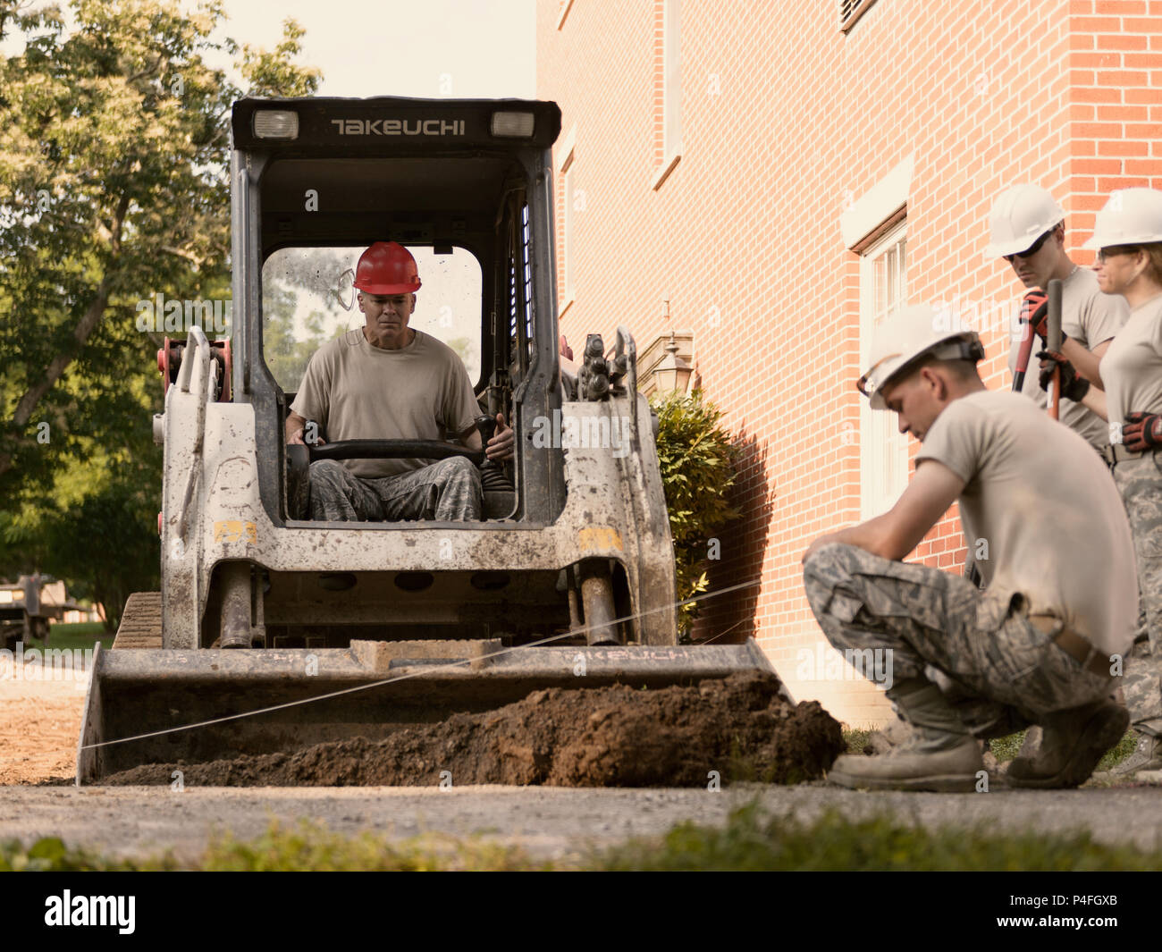 Tech. Sgt. Brian Howard, a pavement and construction supervisor ...