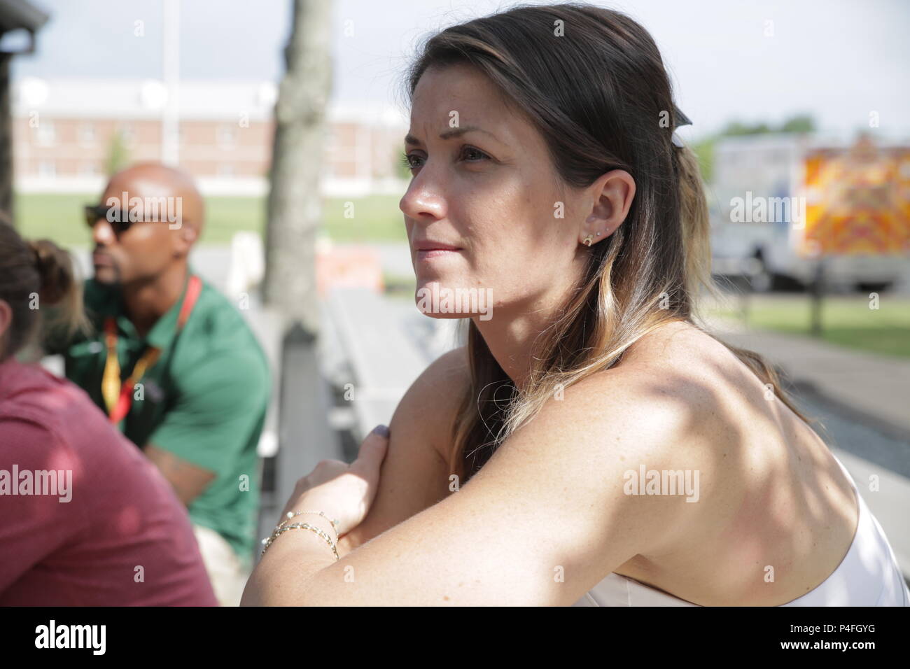 QUANTICO, Va. - Anne Tuck listens to retired Lt. Col. Joseph Shusko ...