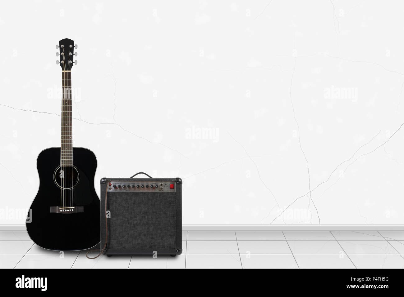 Musical instrument in home interior - Black acoustic guitar, amplifier ...