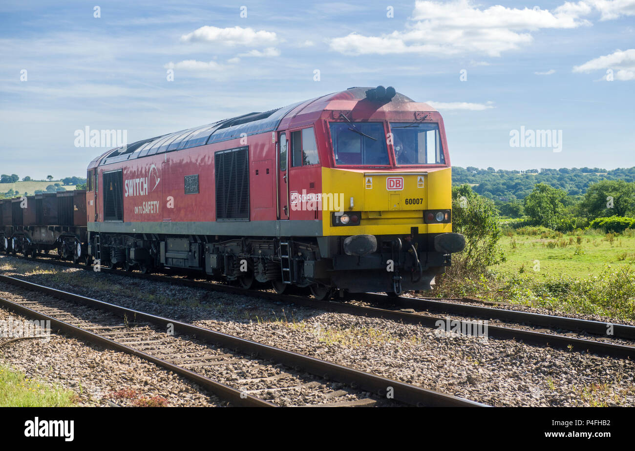 Diesel Locomotive Pulling Empty Goods Wagons Stock Photo - Alamy