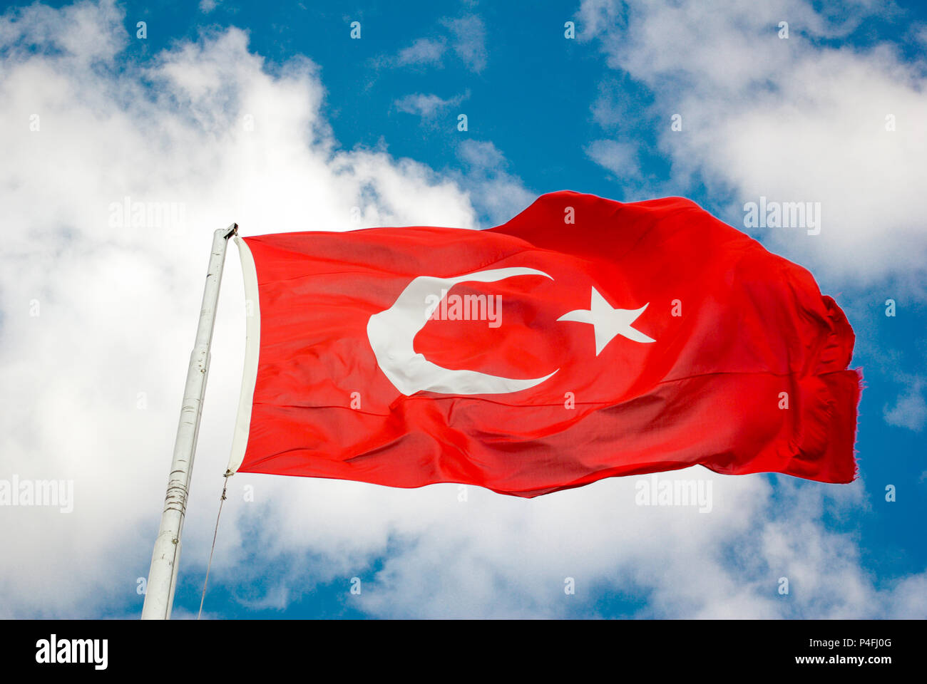 Turkish national flag hang on a pole in open air Stock Photo - Alamy