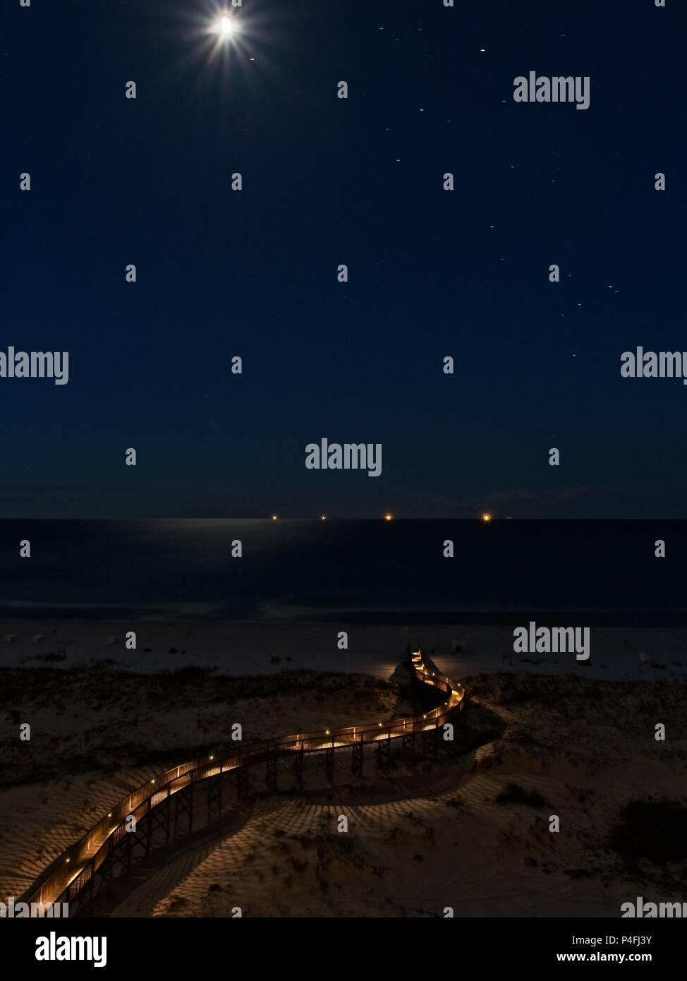 Gulf Shores AL USA - May 6, 2018 - Night view of the beach with lighted ...