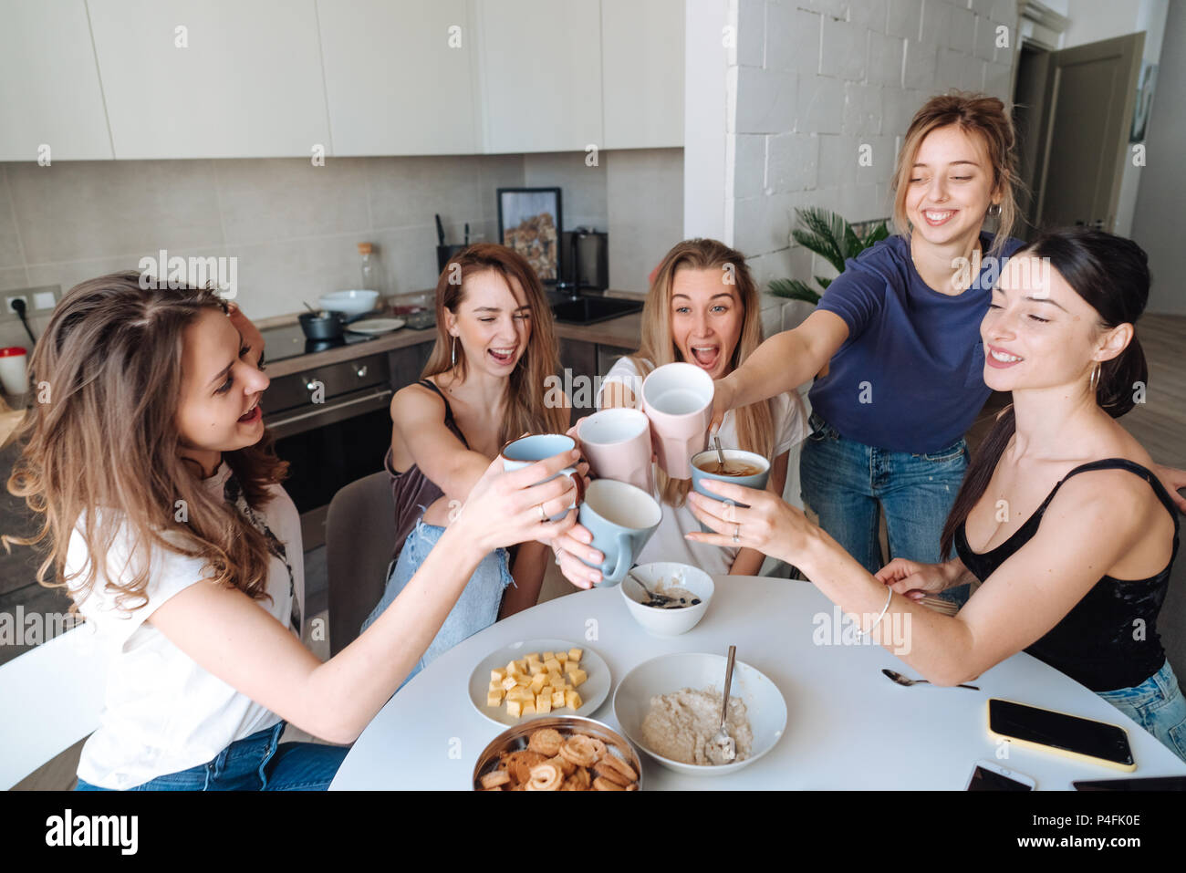 group of women in the kitchen Stock Photo - Alamy