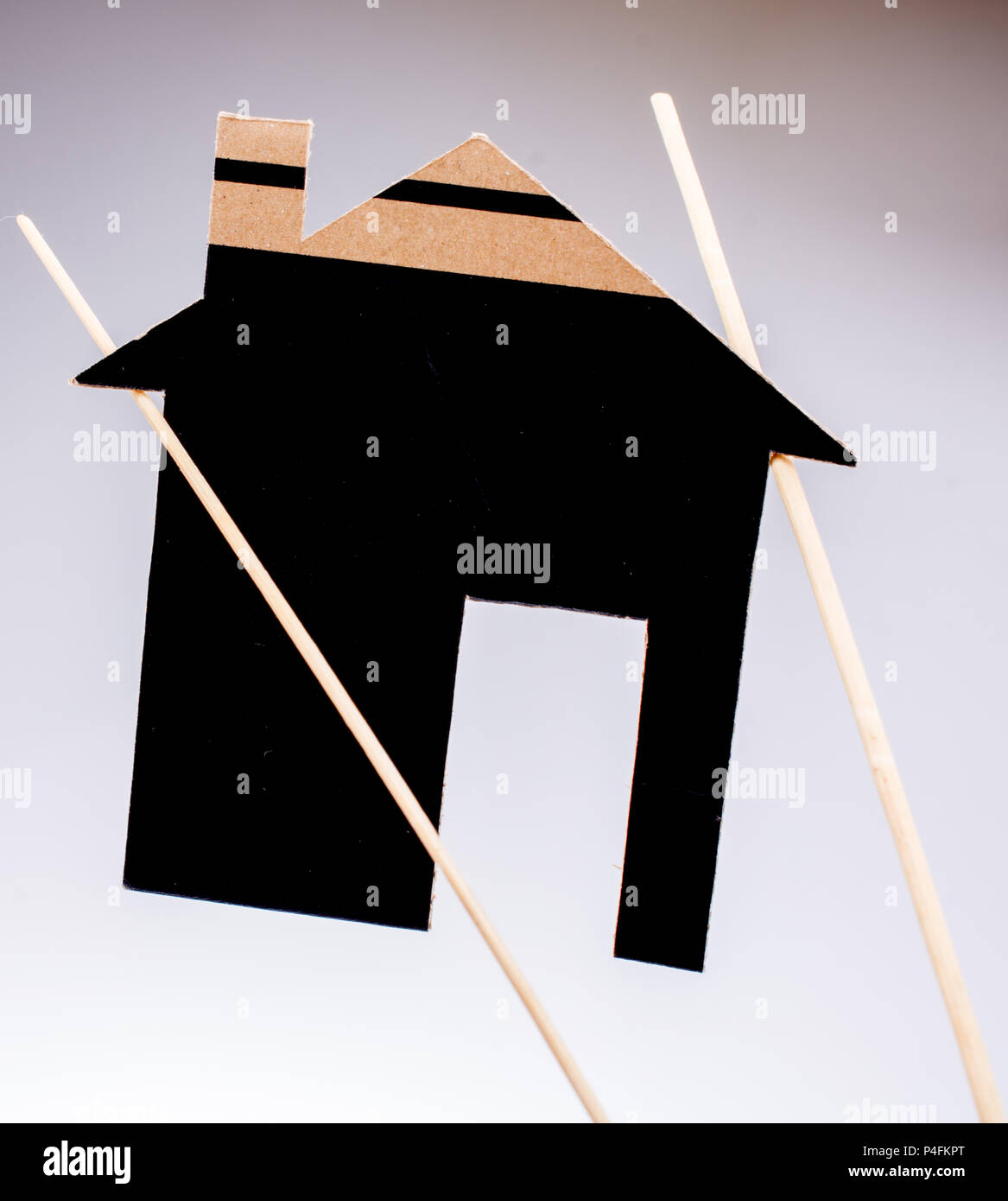 Little house shape cut out of paper on a canvas background Stock Photo ...