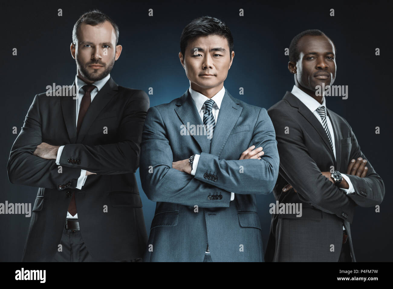 Group of businessmen in suits hi-res stock photography and images - Alamy