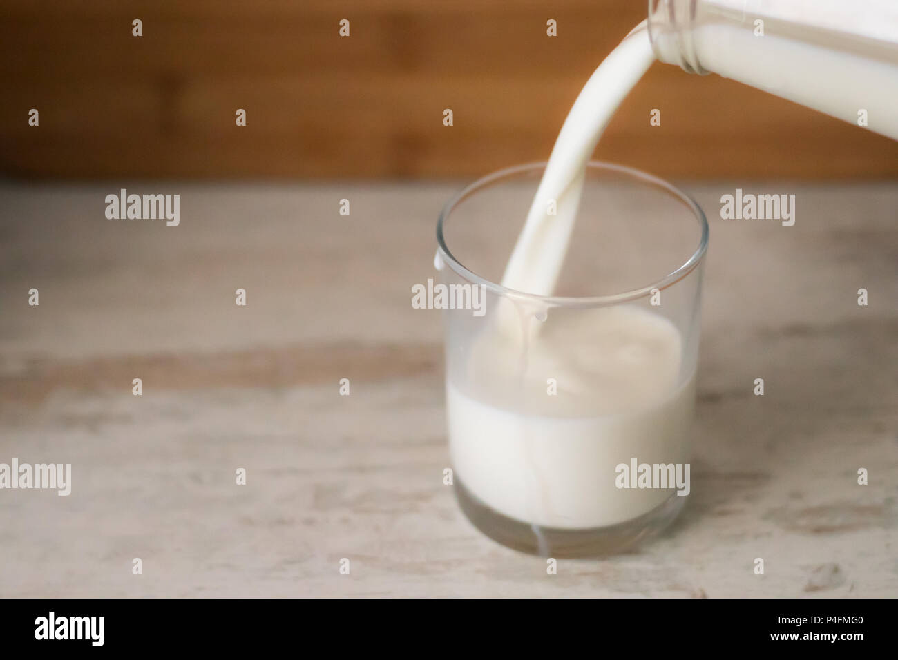 Table pouring milk hi-res stock photography and images - Alamy