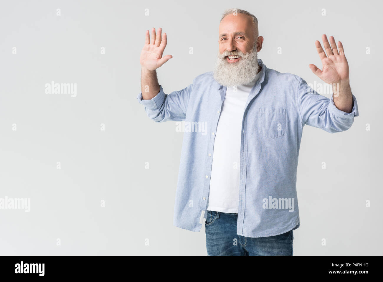 Senior man raised arms hi-res stock photography and images - Alamy
