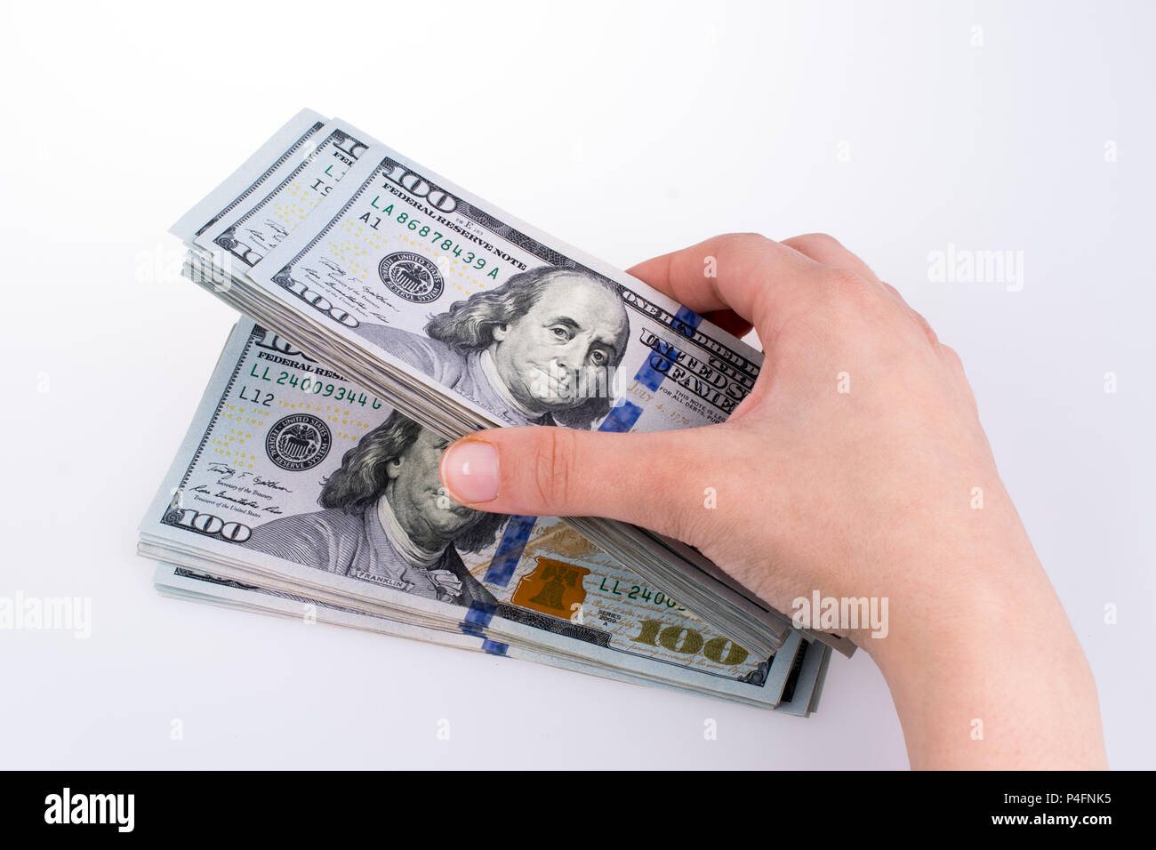 Human hand holding American dollar bill as money isolated on white ...