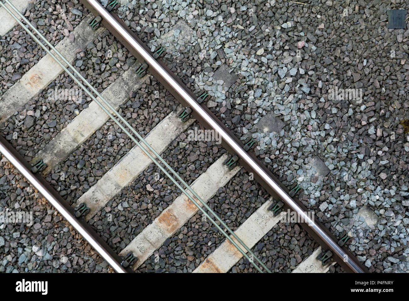 Section of train tracks on the rail line, overhead shot Stock Photo - Alamy