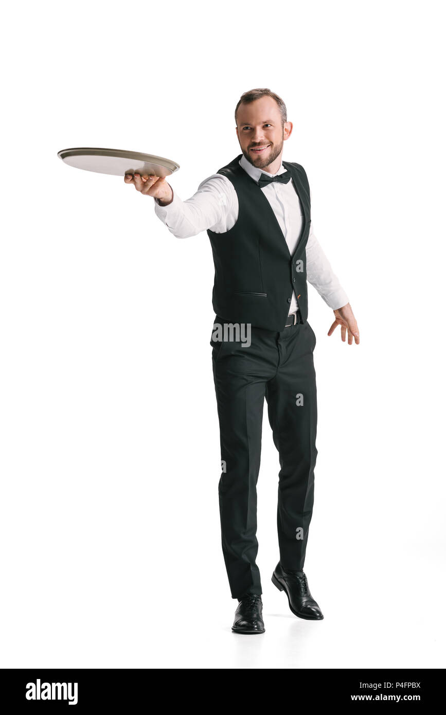 smiling handsome waiter in suit with tray isolated on white Stock Photo ...