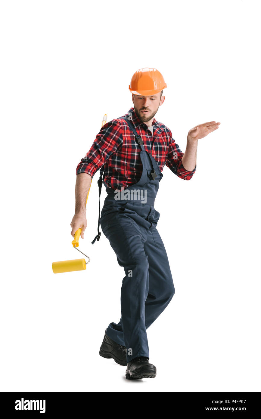 handsome construction worker with roller brush isolated on white Stock ...