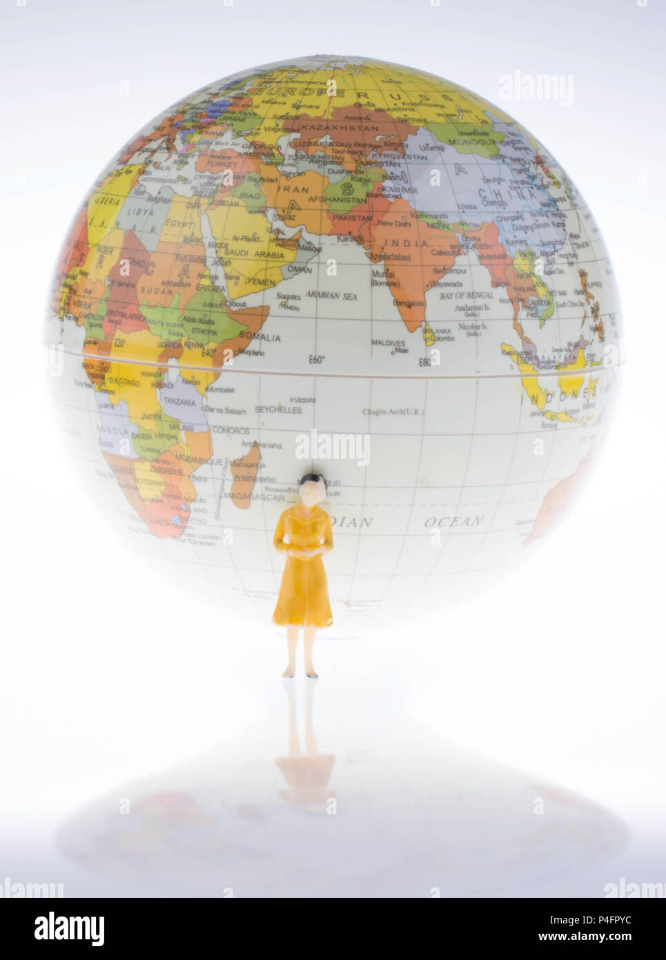 Figure woman global earth hi-res stock photography and images - Alamy