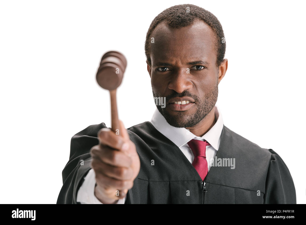critical judge pointing at camera with gavel isolated on white Stock ...