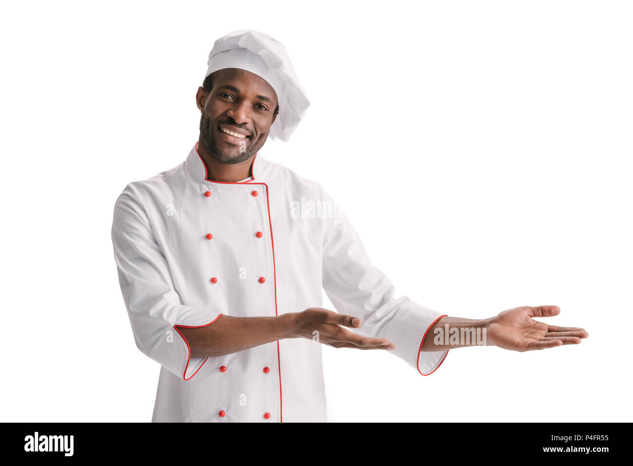 happy african-american chef doing presentation on copy space isolated ...