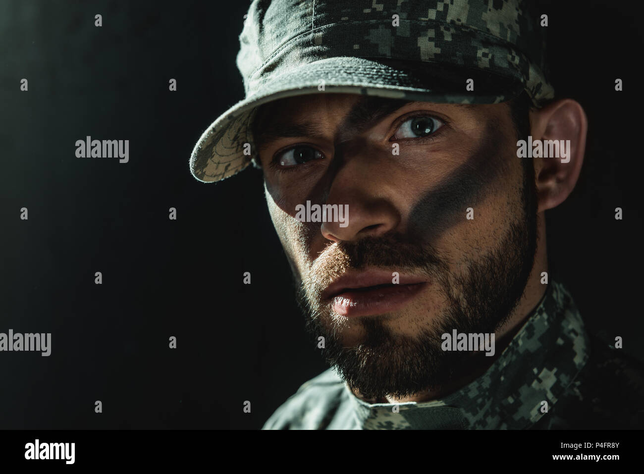 Portrait young soldier looking camera hi-res stock photography and ...