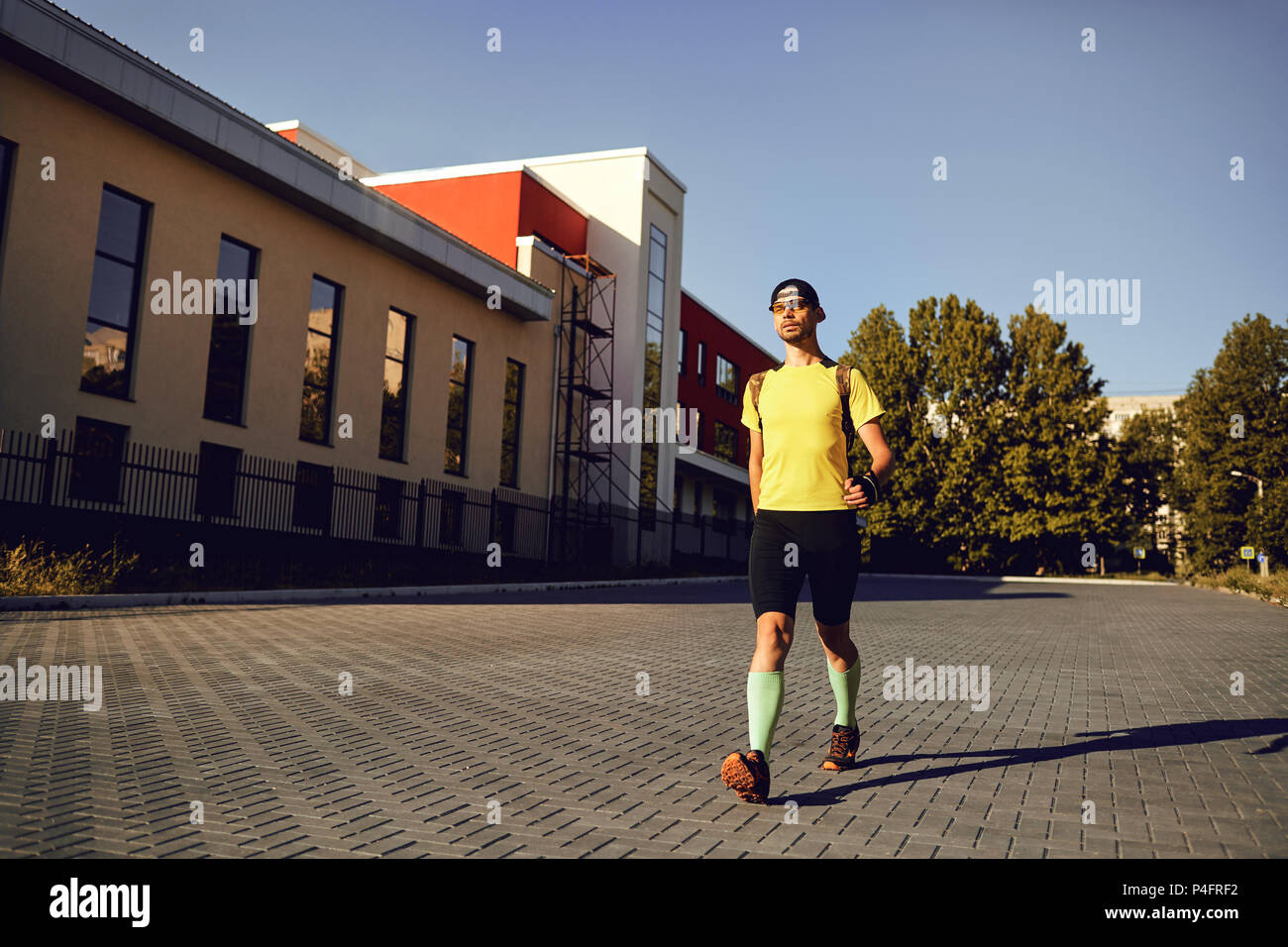 Man walks city street hi-res stock photography and images - Alamy