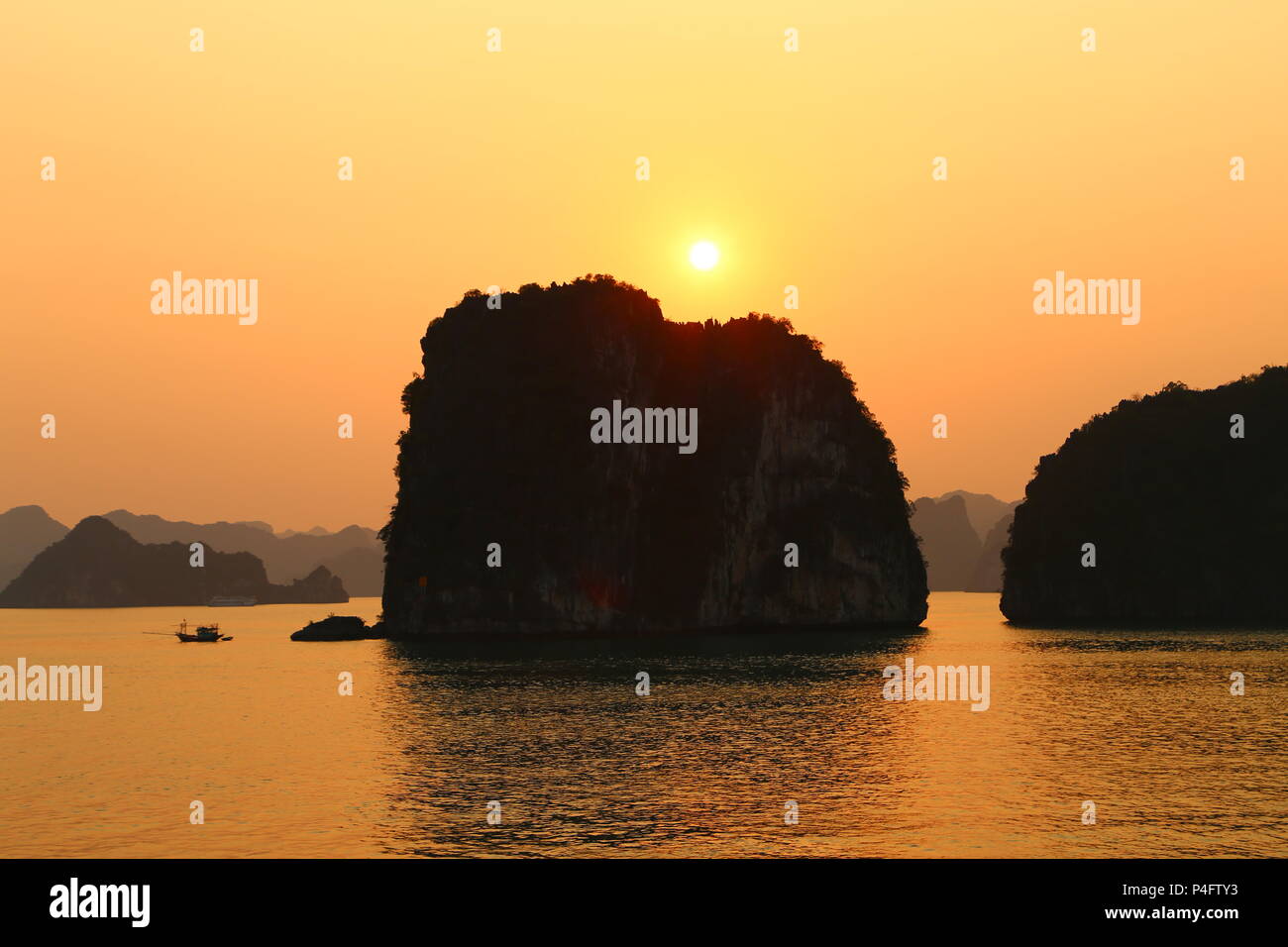 Sunset on Ha Long Bay Stock Photo - Alamy