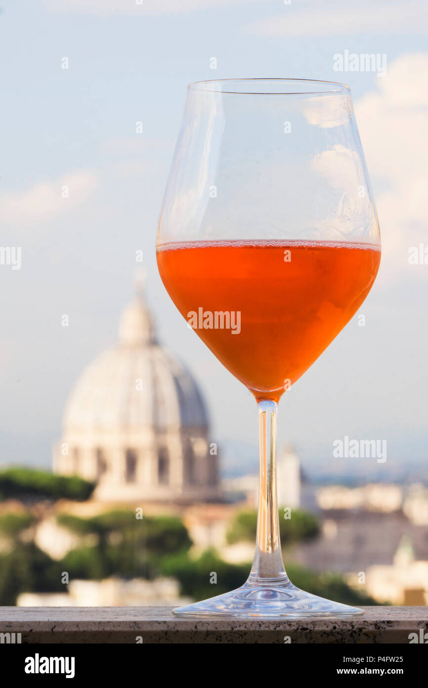 Italian aperitif with St Peter's basilica, Rome, in the background ...