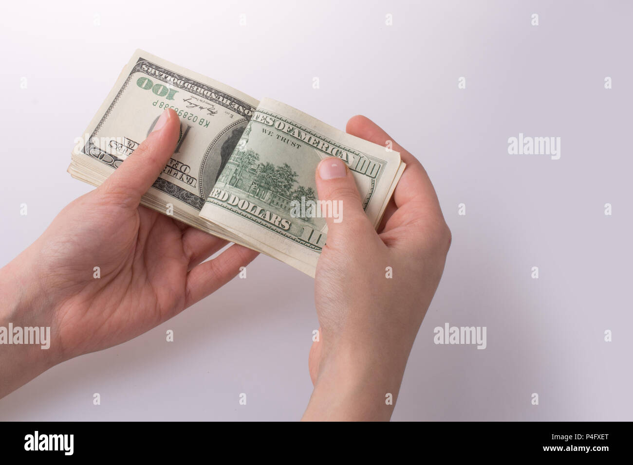 Human hand holding American dollar bill as money isolated on white ...