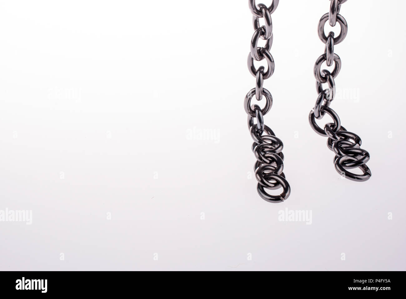 metal chain on white background Stock Photo - Alamy