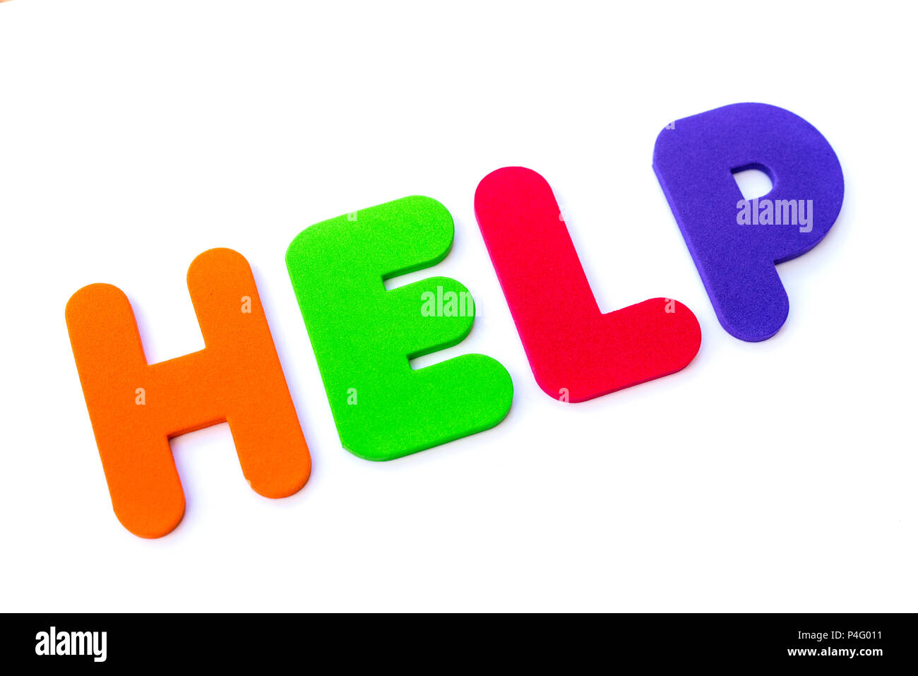 The word HELP spelt in multi-coloured letters Stock Photo - Alamy
