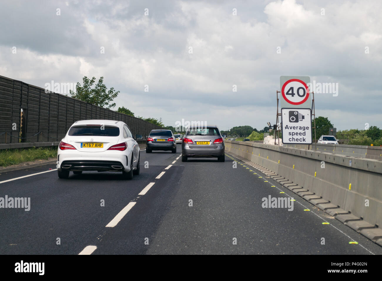 Vehicles drive along a section of the A14 near Cambridge with road ...