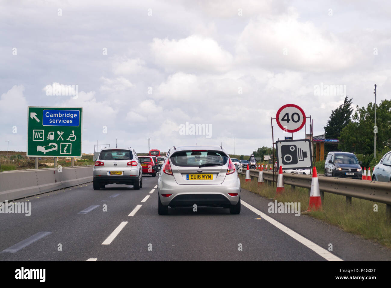 Vehicles drive along a section of the A14 near Cambridge with road ...