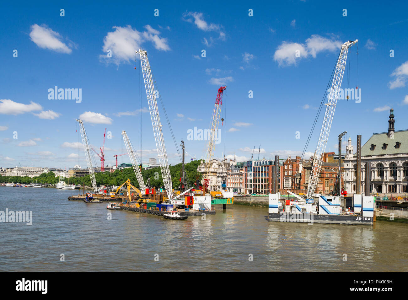 The Thames Tideway Scheme under construction with heavy machinery on ...