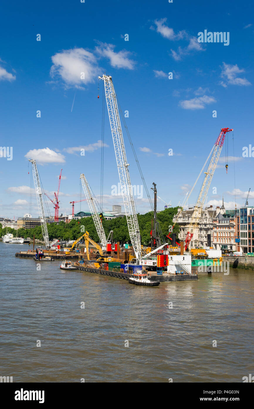 The Thames Tideway Scheme under construction with heavy machinery on ...