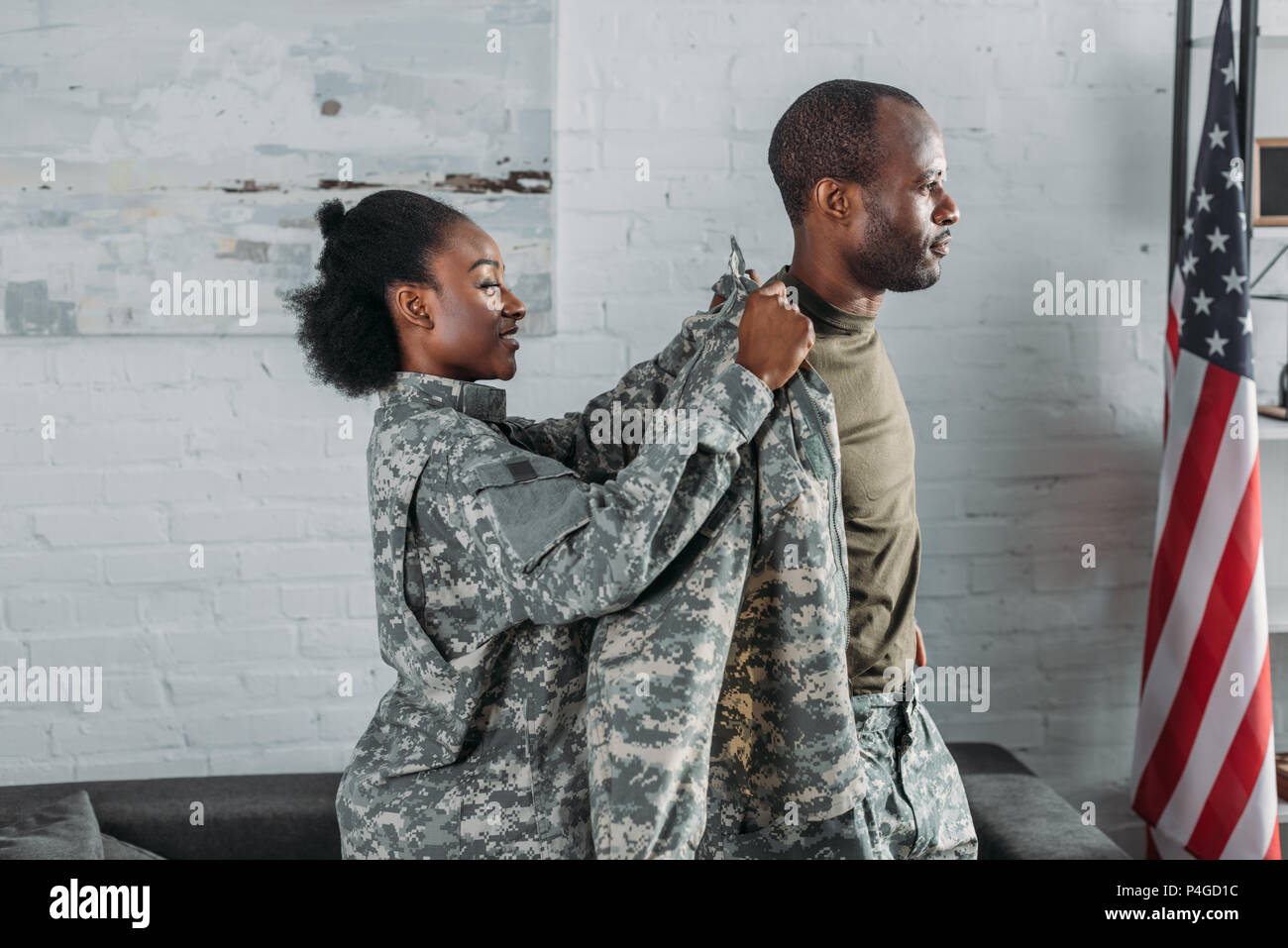 Us soldier helping man hi-res stock photography and images - Alamy