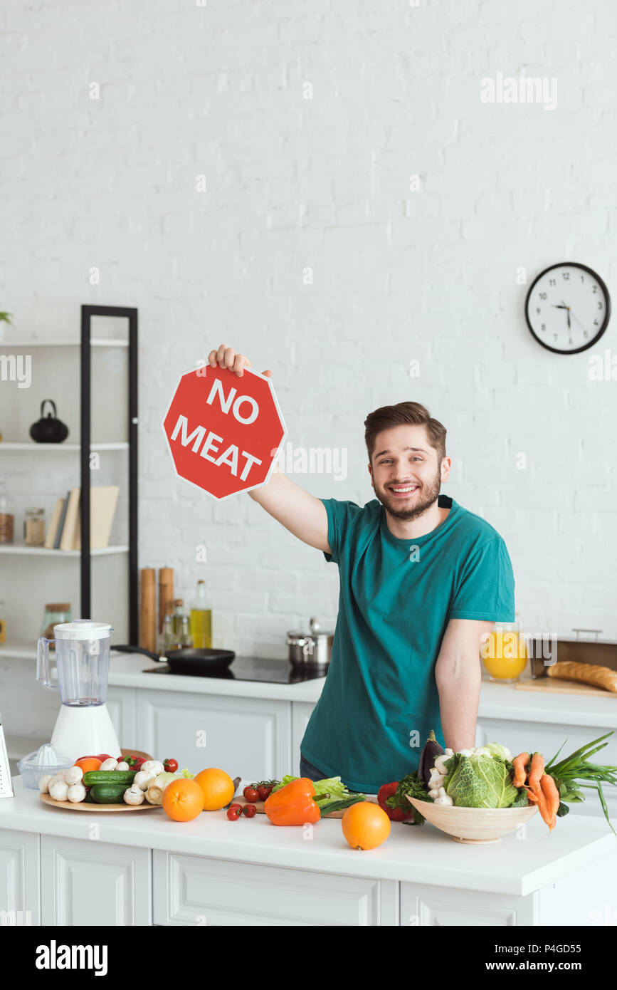 Man eating vegan meat hi-res stock photography and images - Alamy
