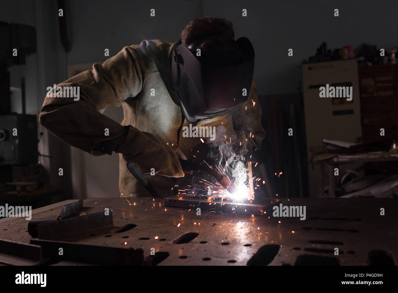 Man welding in uniform hi-res stock photography and images - Alamy