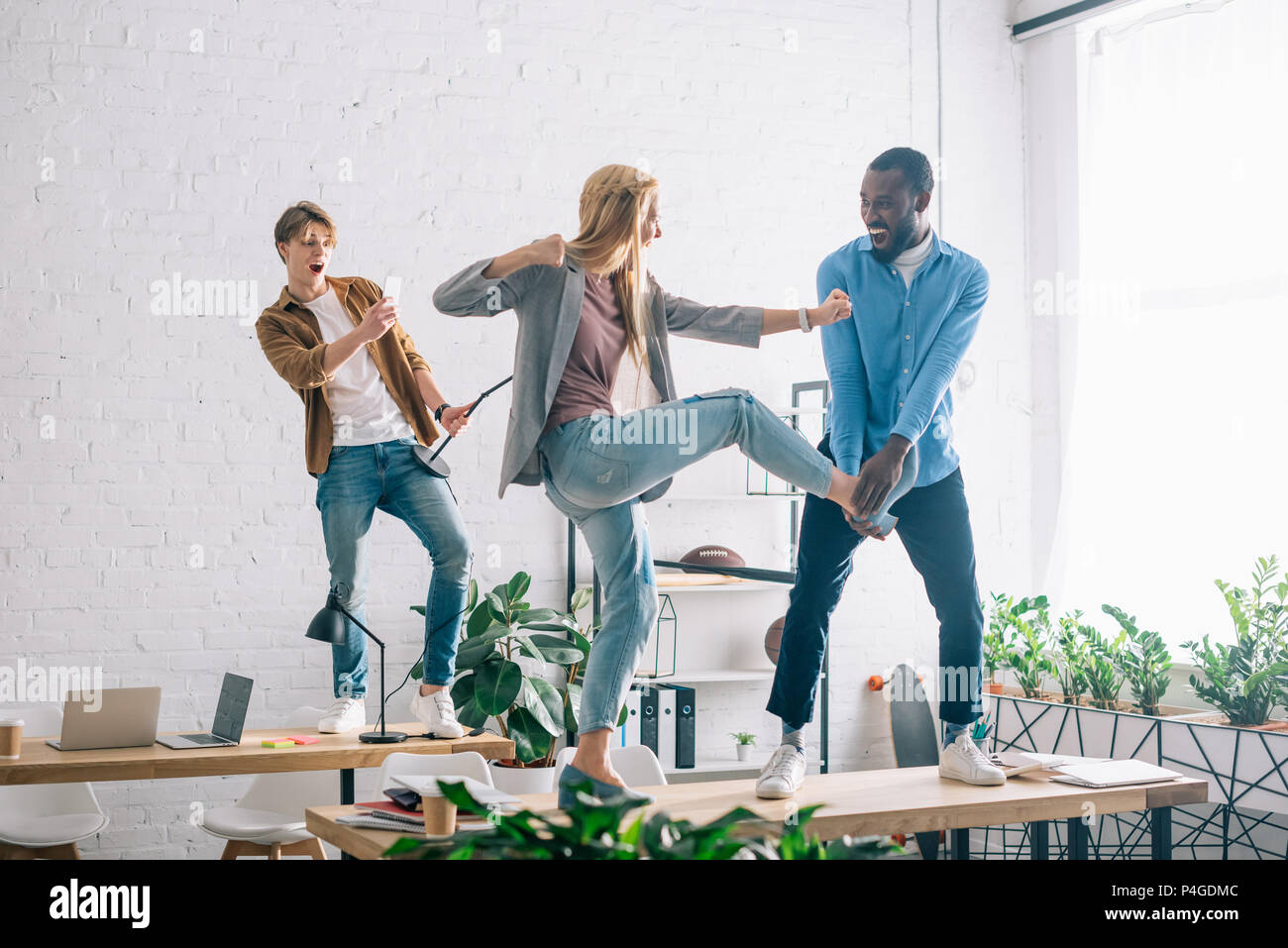 businessman taking picture of multiethnic business colleagues fighting ...