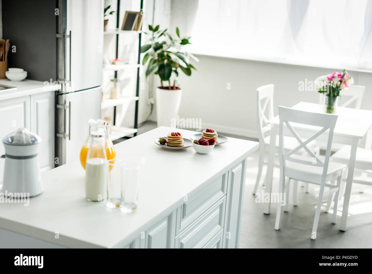 interior of modern light kitchen with pancakes on kitchen counter Stock ...