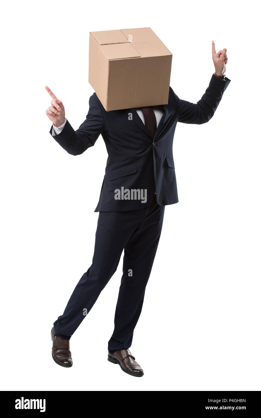 happy businessman with cardboard box on head pointing up, isolated on ...