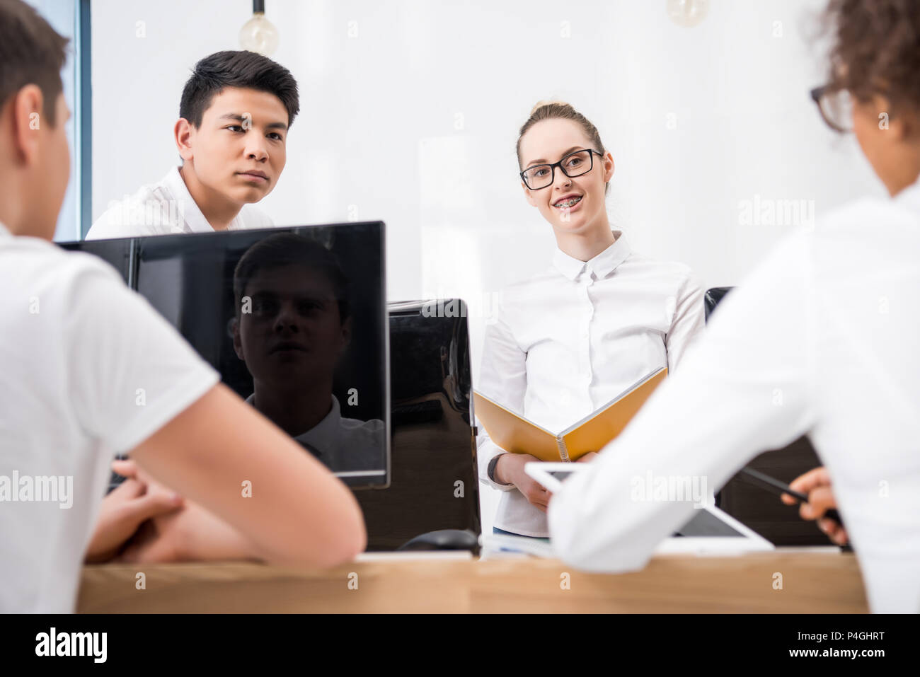 young multicultural teen students studying together Stock Photo - Alamy