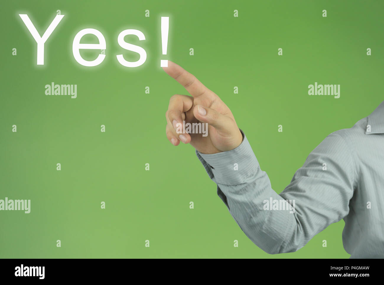 hand of the businessman pointing to the Yes! text on green background ...