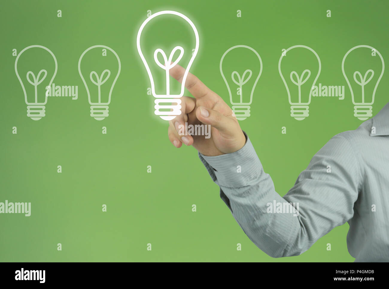 Hand of businessman pointing to a light bulb in the concept of design ...