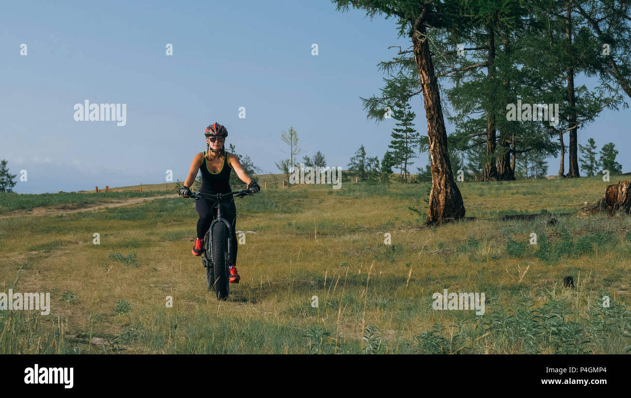 Fat bike also called fatbike or fat-tire bike in summer riding in the ...
