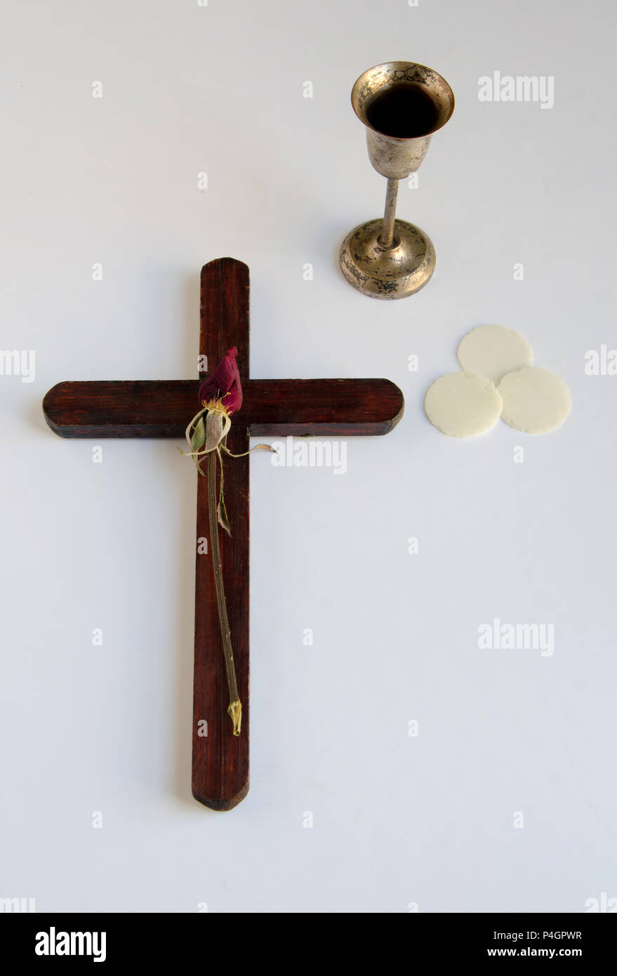 Cross , red rose , bread and wine Stock Photo - Alamy