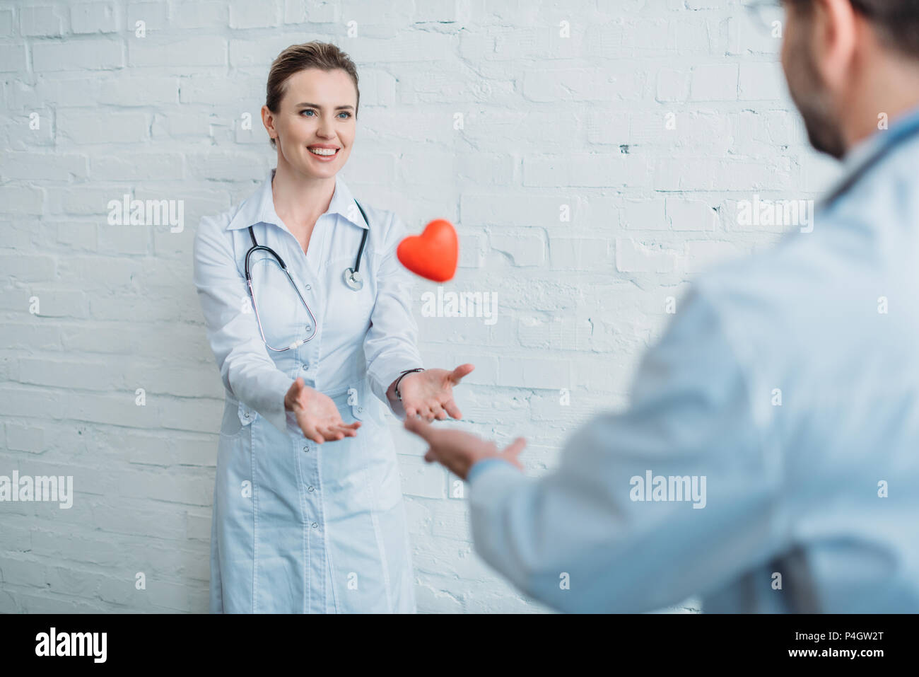 Man throwing red heart hi-res stock photography and images - Alamy