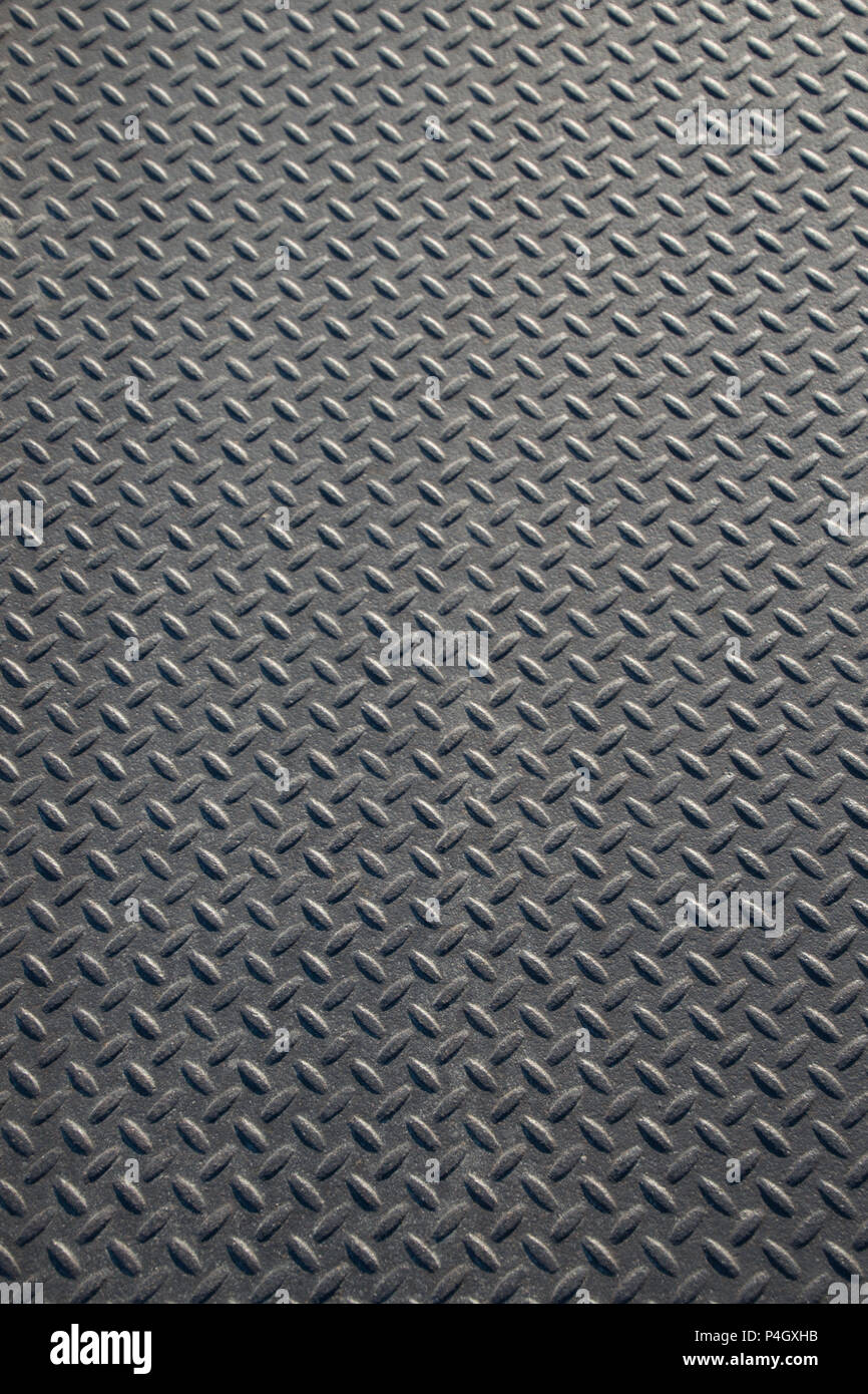 Closeup of distressed, mottled, grungy industrial checker plate rusty ...