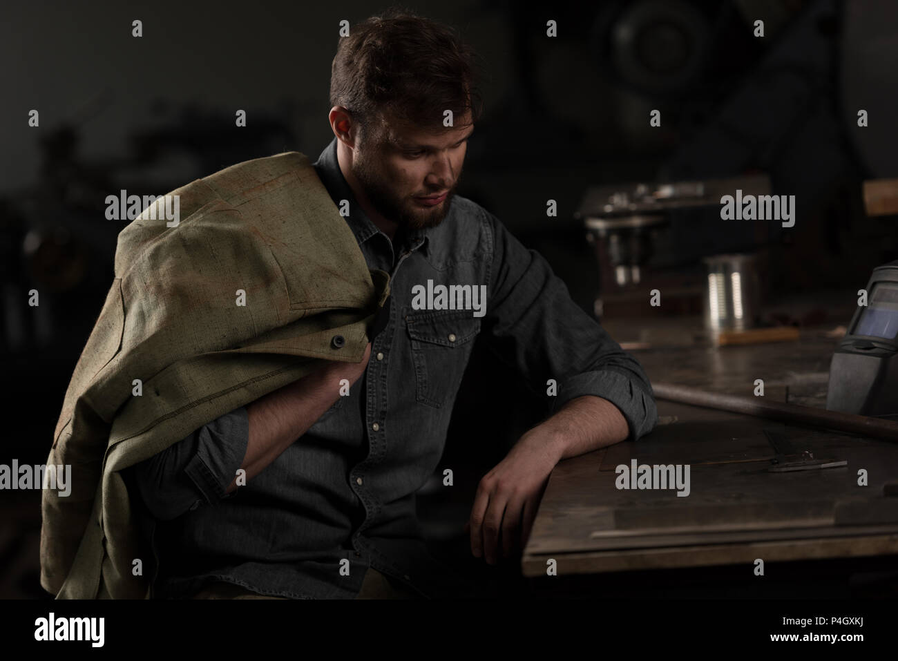 Workman sitting hi-res stock photography and images - Alamy