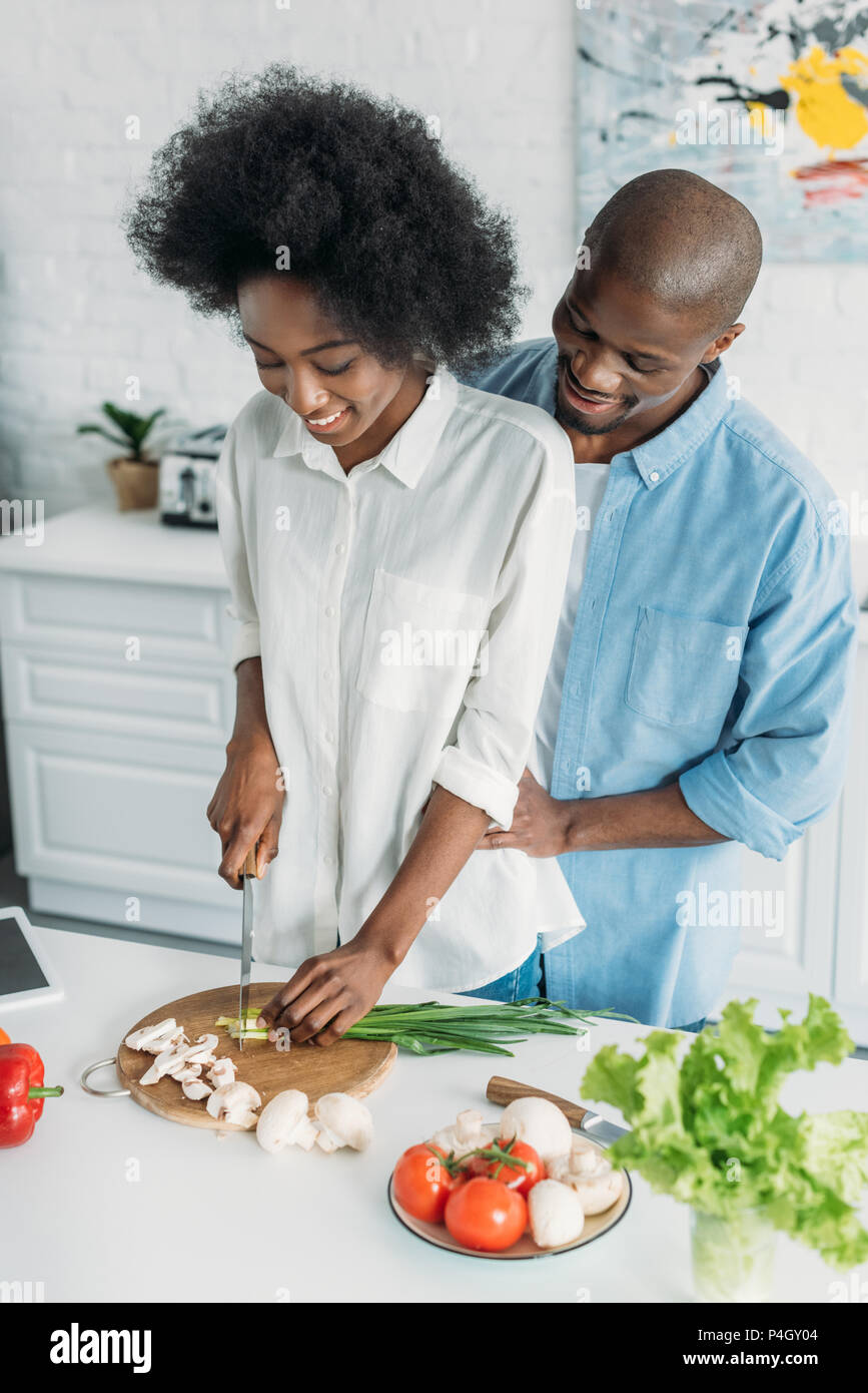 african american cooking breakfast together in kitchen at home Stock ...