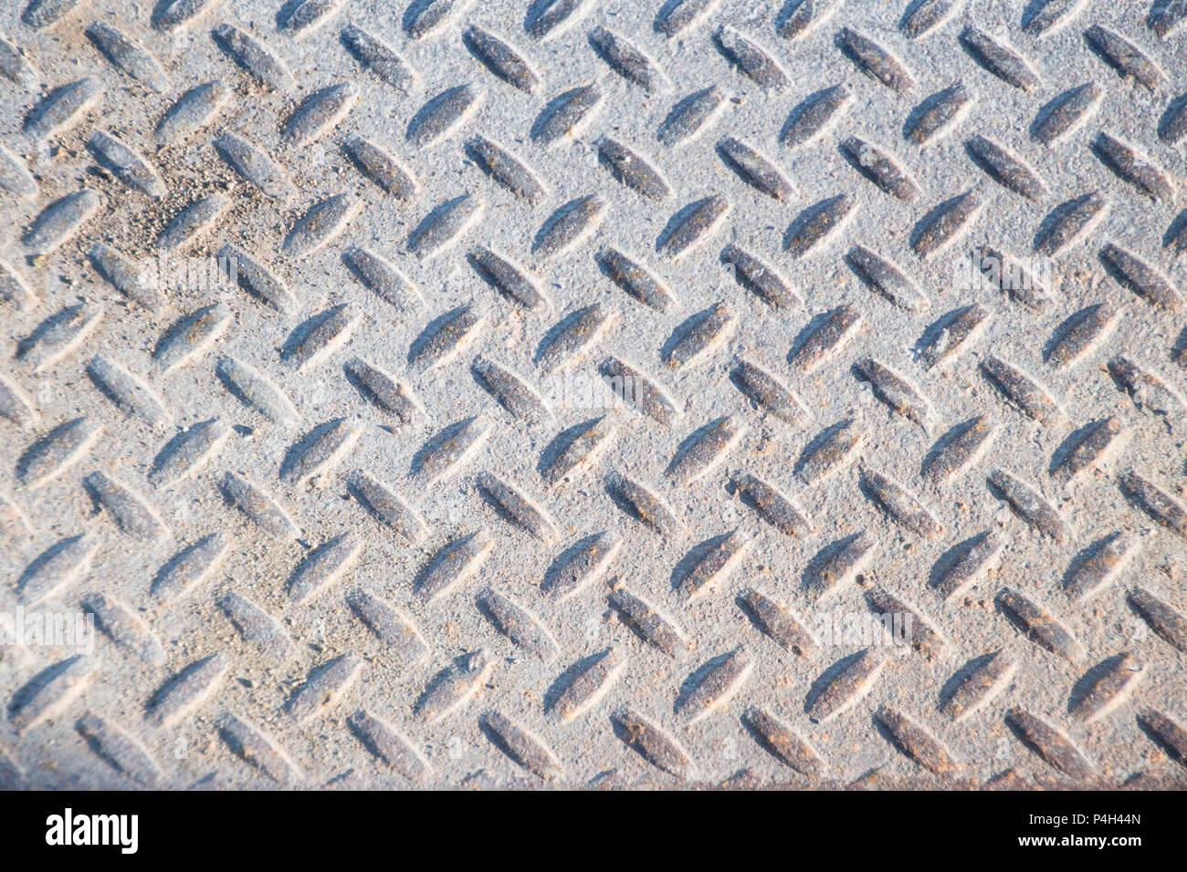Closeup landscape of a distressed, mottled, gungy industrial ...