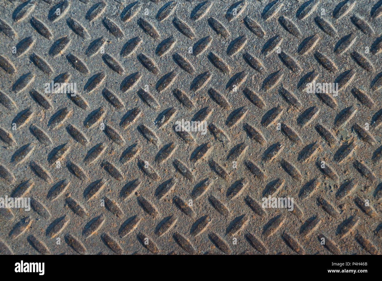 Closeup landscape of a distressed, mottled, gungy industrial ...