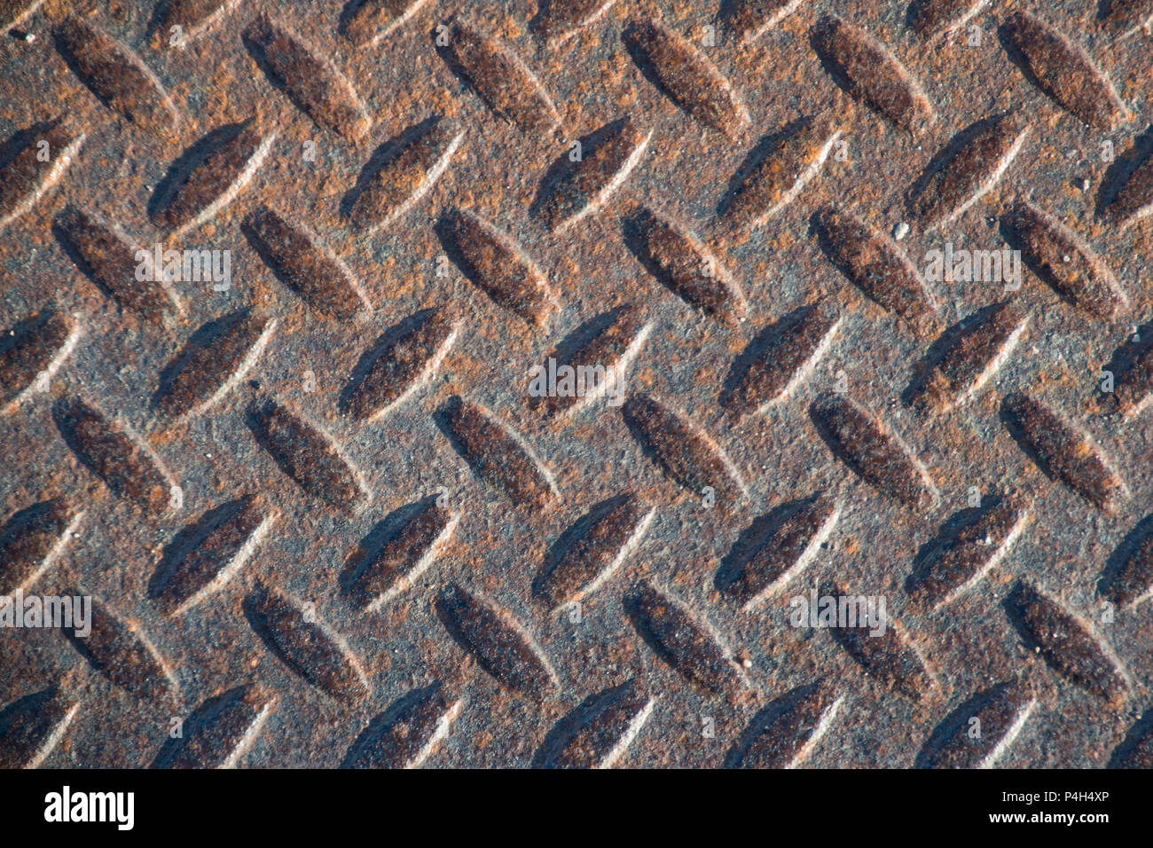 Closeup landscape of a distressed, mottled, gungy industrial ...